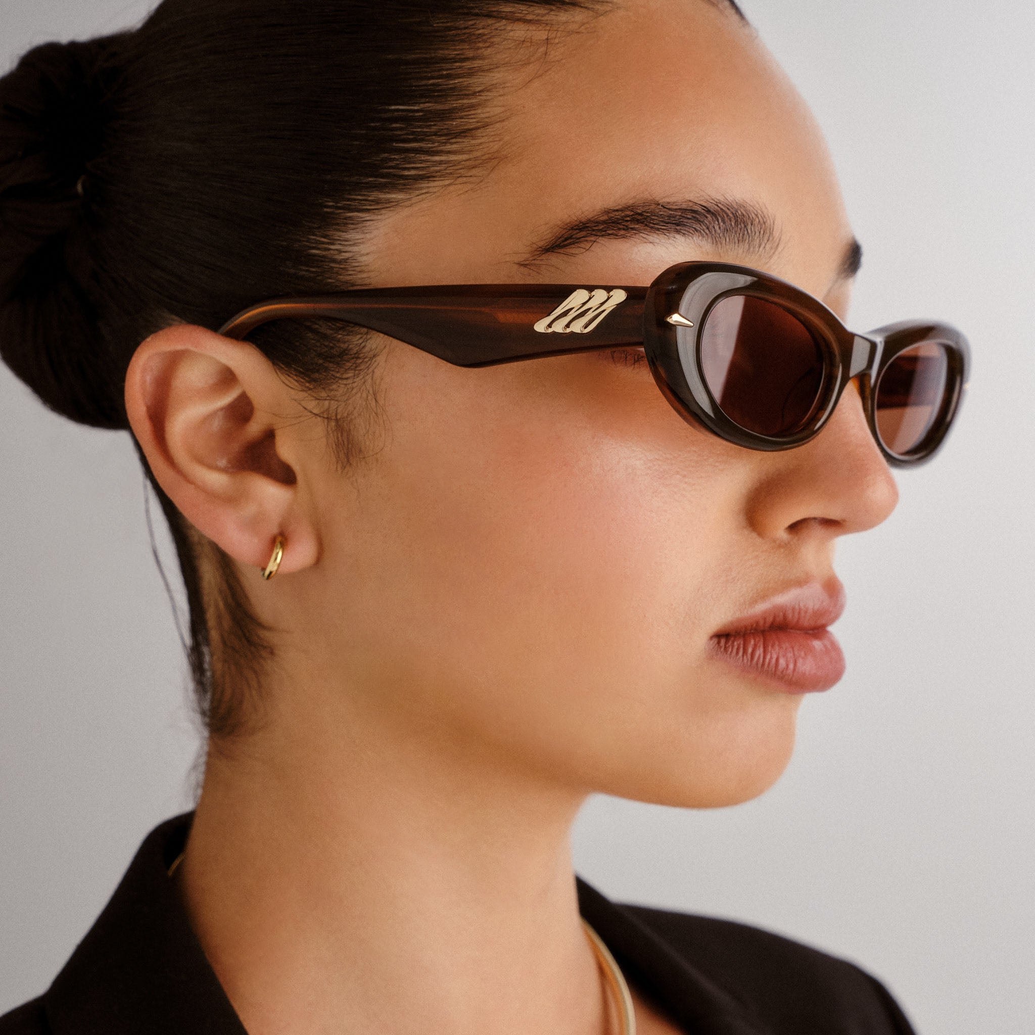 Numero Uno Teak Female Oval Sunglasses | Le Specs